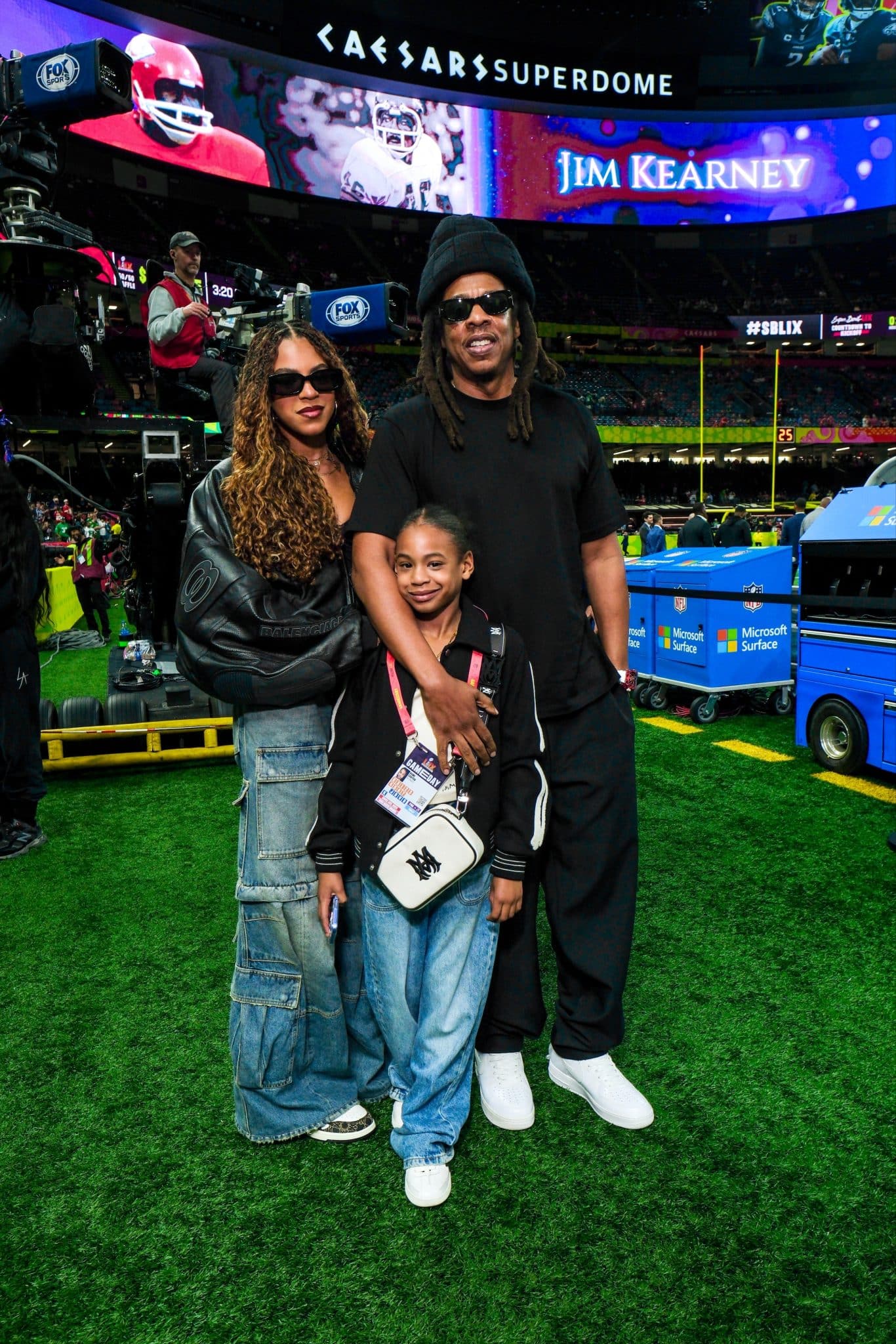 Hot Shot: Jay-Z All Smiles with Daughters Blue Ivy & Rumi at the Super Bowl 2025 - That Grape Juice